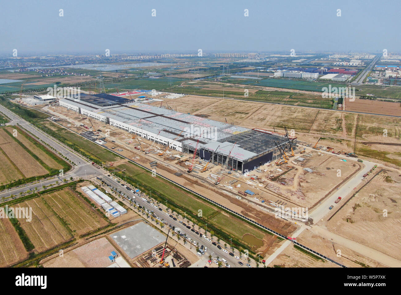 Aerial view of the Tesla Shanghai Gigafactory under construction in ...