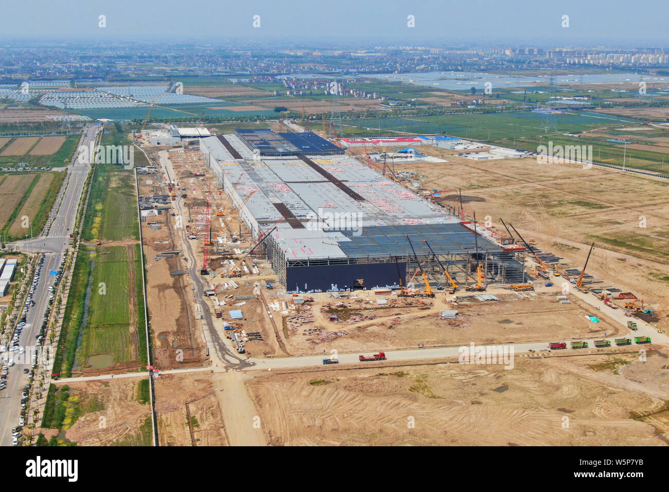 Aerial view of the Tesla Shanghai Gigafactory under construction in ...