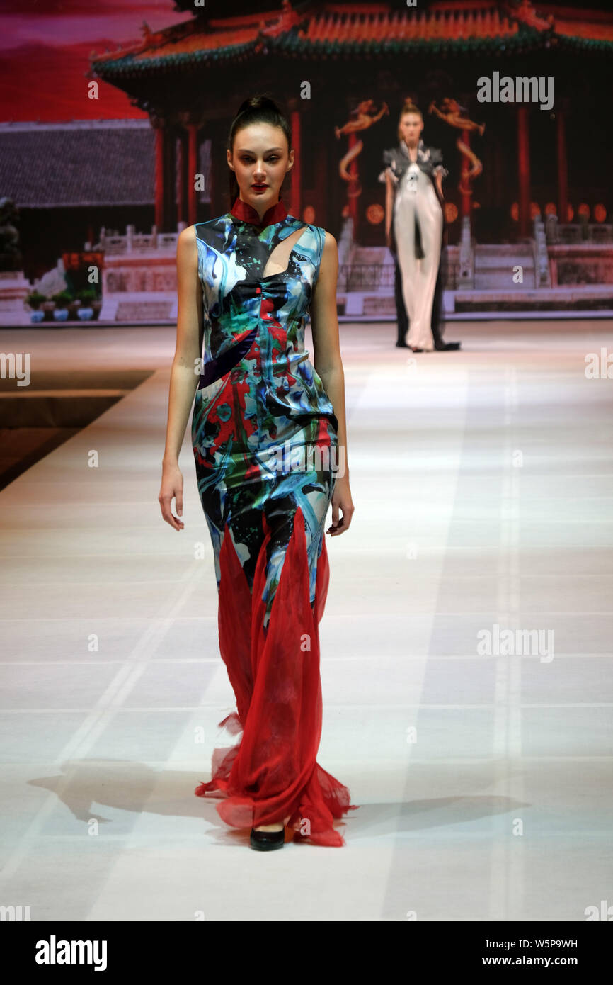 A model dressed in Cheongsam, a traditional Chinese dresses also known ...