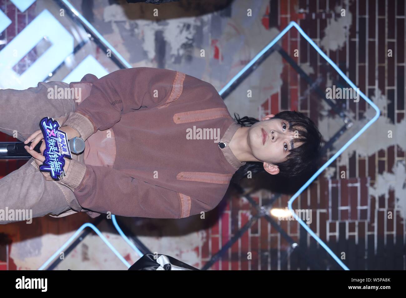 Jackson Yee or Yi Yangqianxi of Chinese boy group TFBoys attends a ...