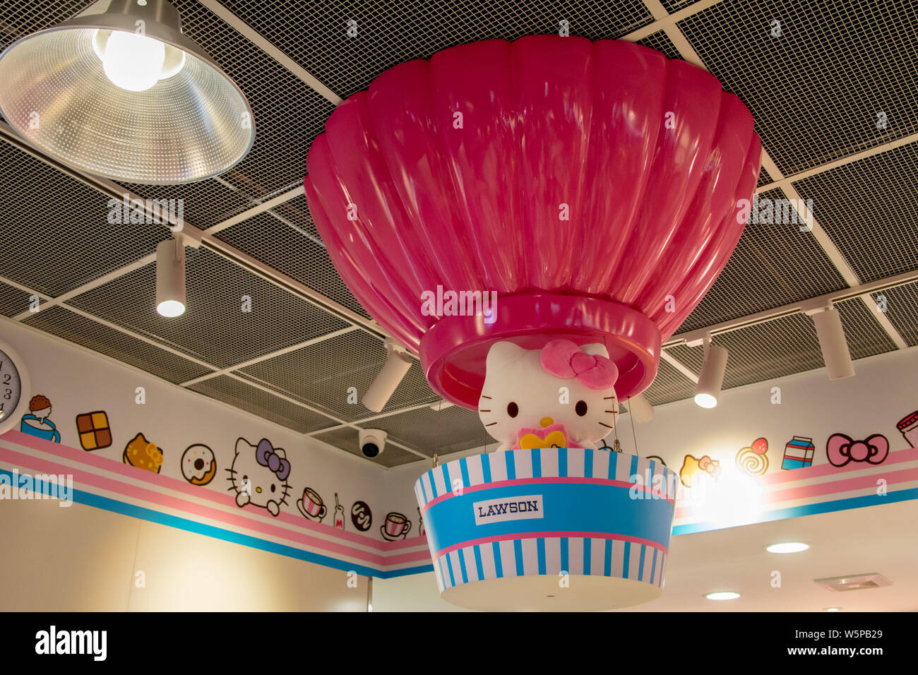 Customers shop at a Hello Kitty-themed Lawson convenience store in ...
