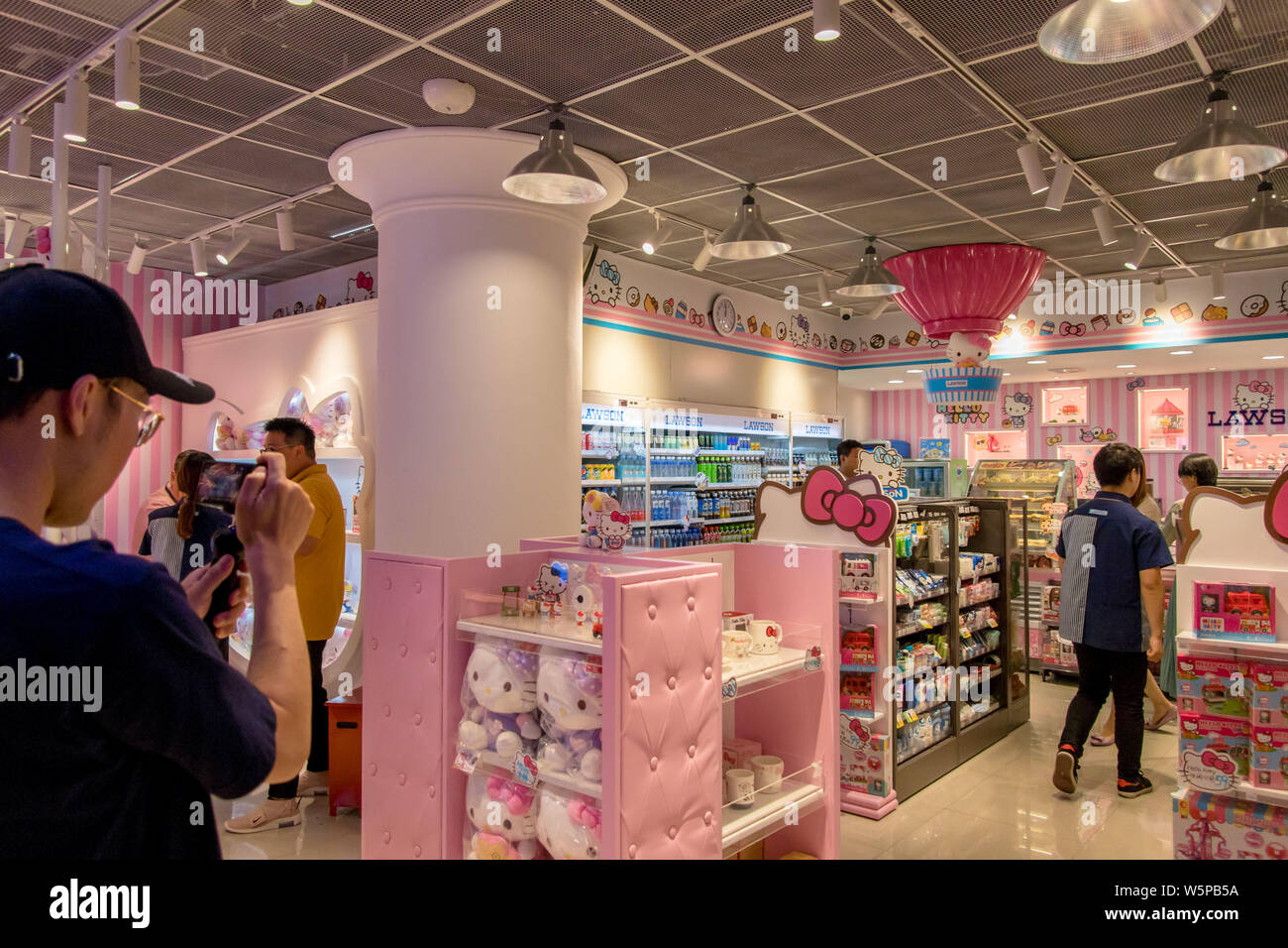 Customers shop at a Hello Kitty-themed Lawson convenience store in ...
