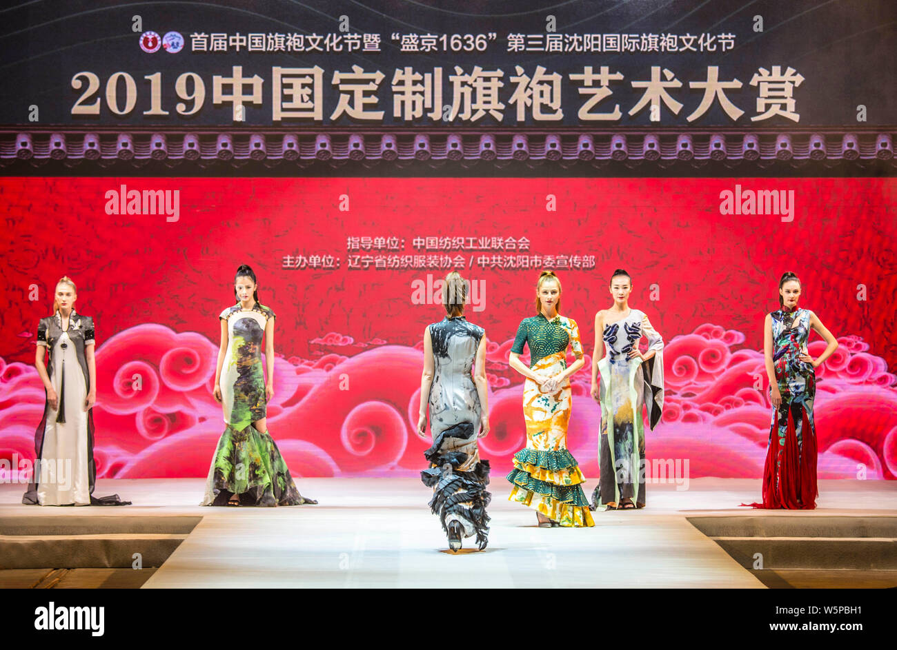 A model dressed in Cheongsam, a traditional Chinese dresses also known ...