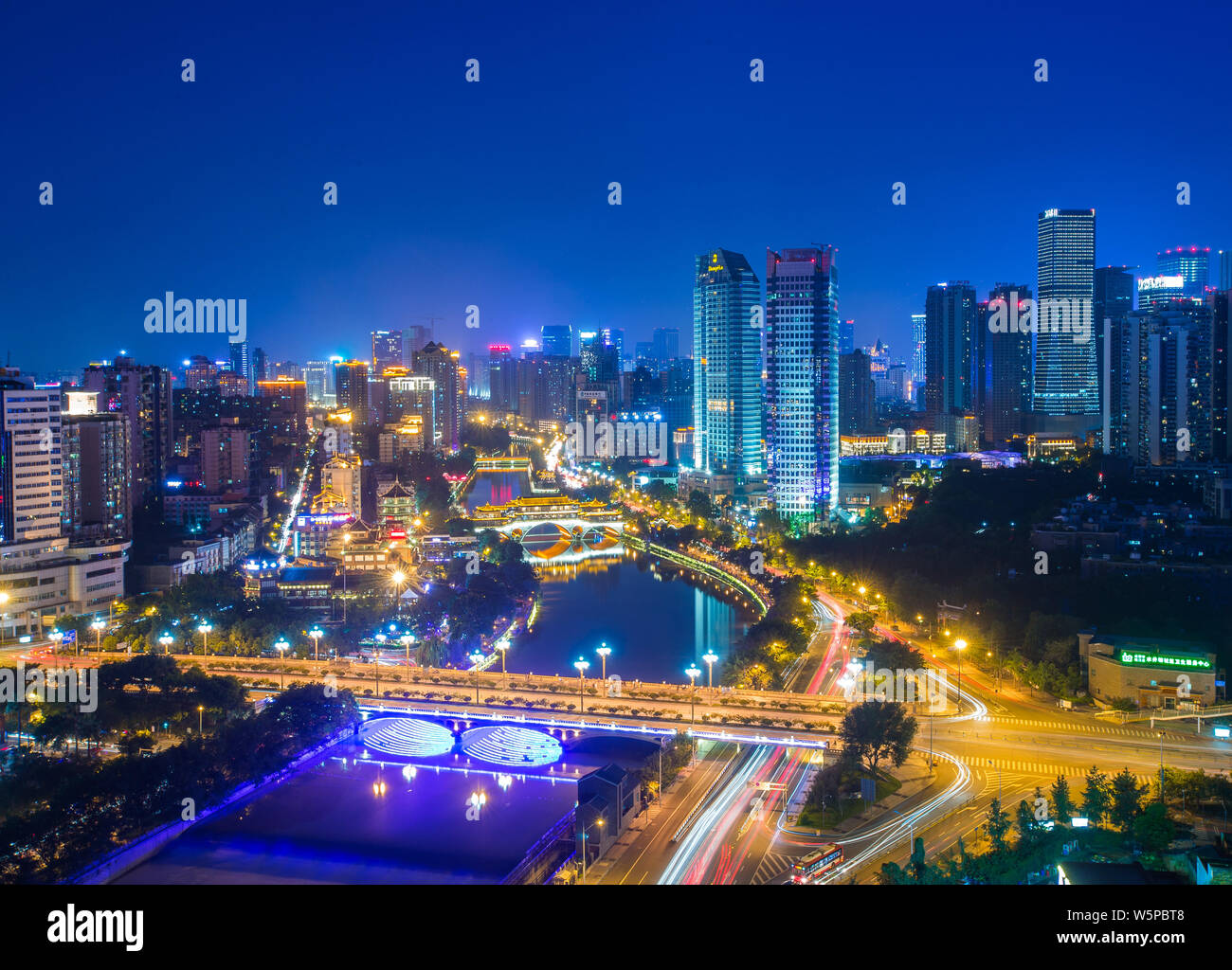 A night view of the Anshun Bridge, middle, over the Jin River or ...