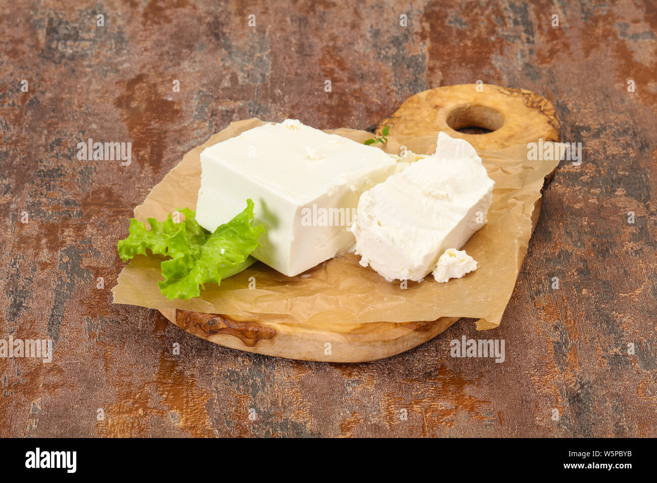 Greek traditional Feta soft cheese in the plate Stock Photo - Alamy