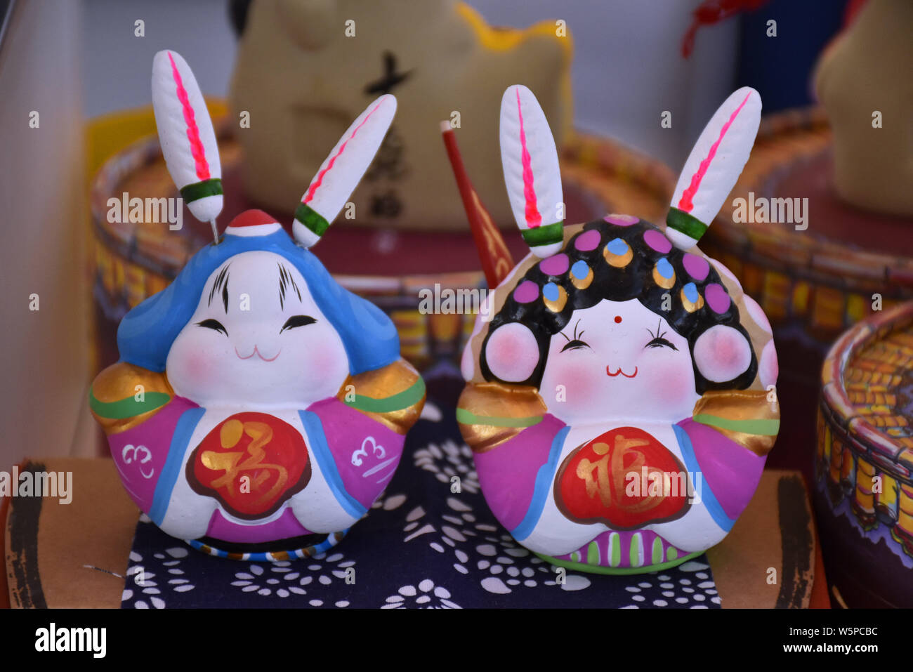The souvenirs featuring traditional Chinese elements are for sale at a ...
