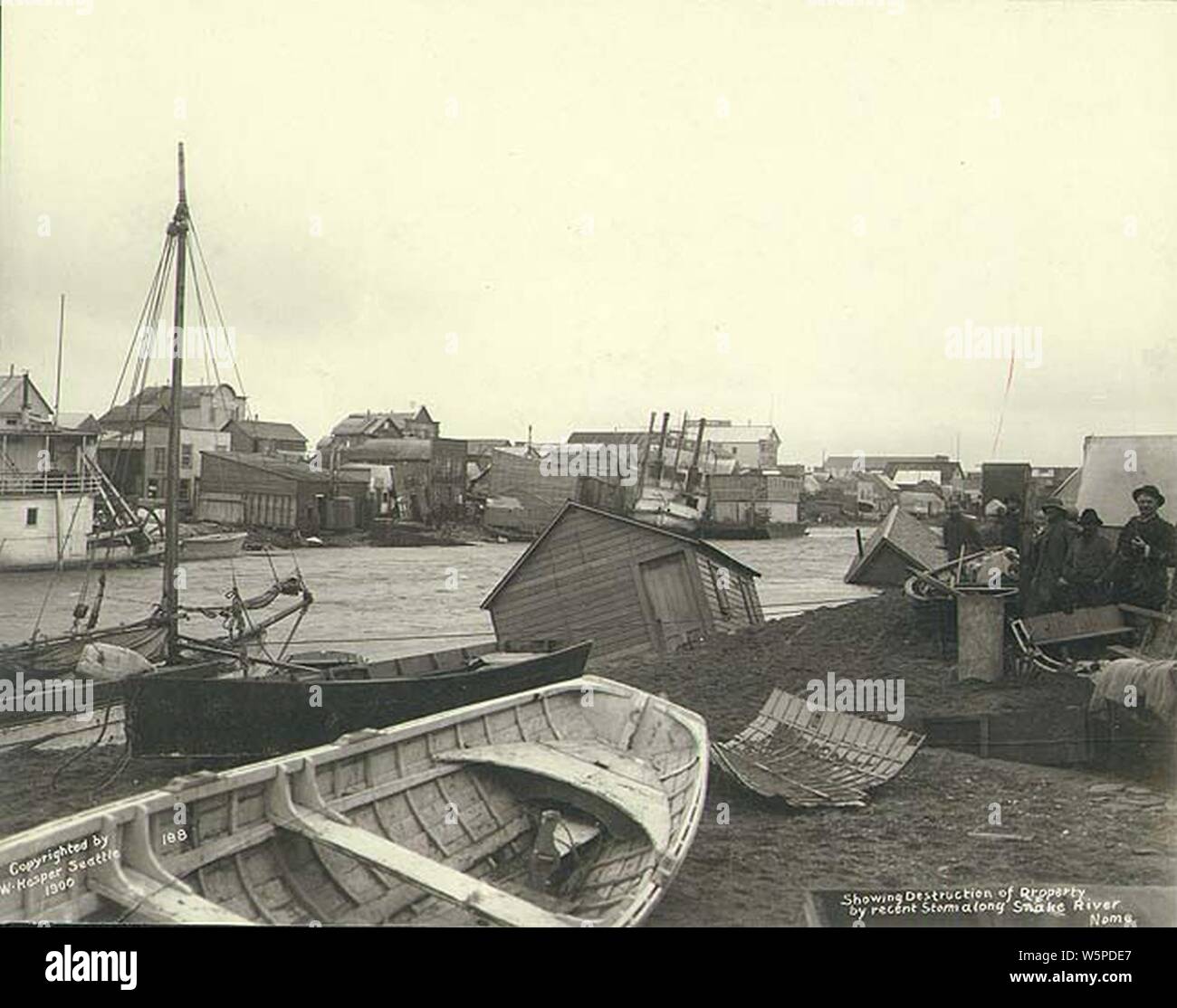 Damage done by storm to buildings and boats along the Snake River Nome ...