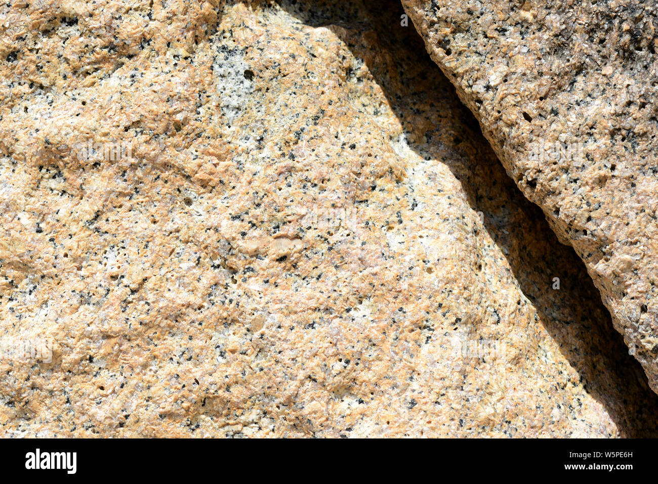 Texture of rocks on the seashore close-up. Natural stone background ...