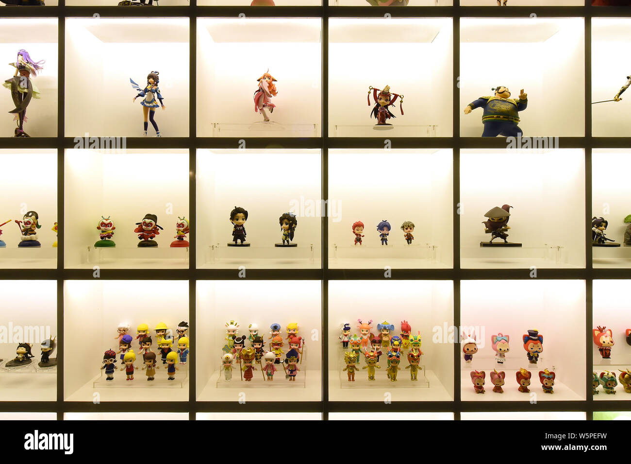 Statuettes of Chinese animation figures are on display at a pop-up ...