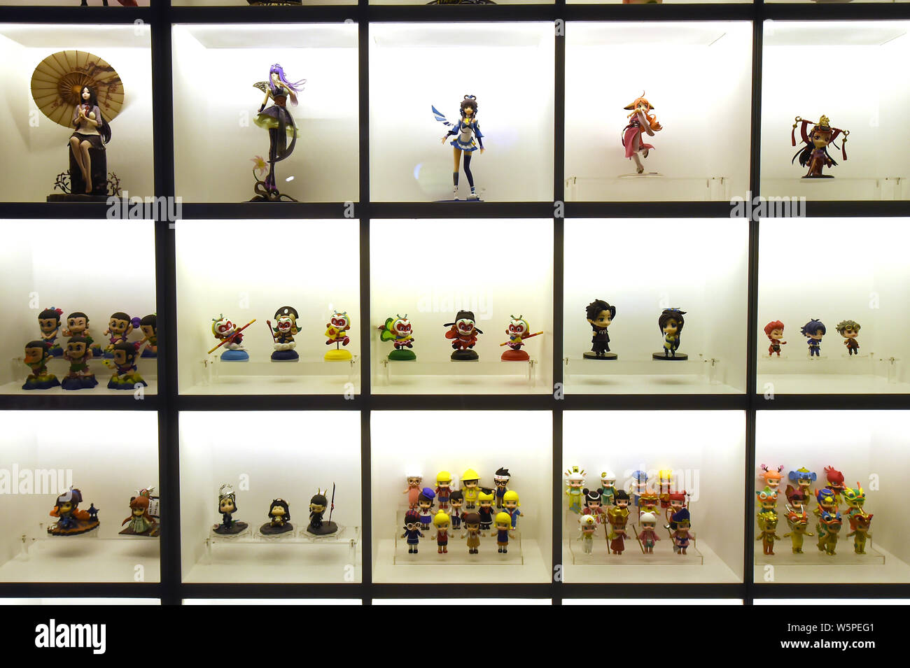 Statuettes of Chinese animation figures are on display at a pop-up ...