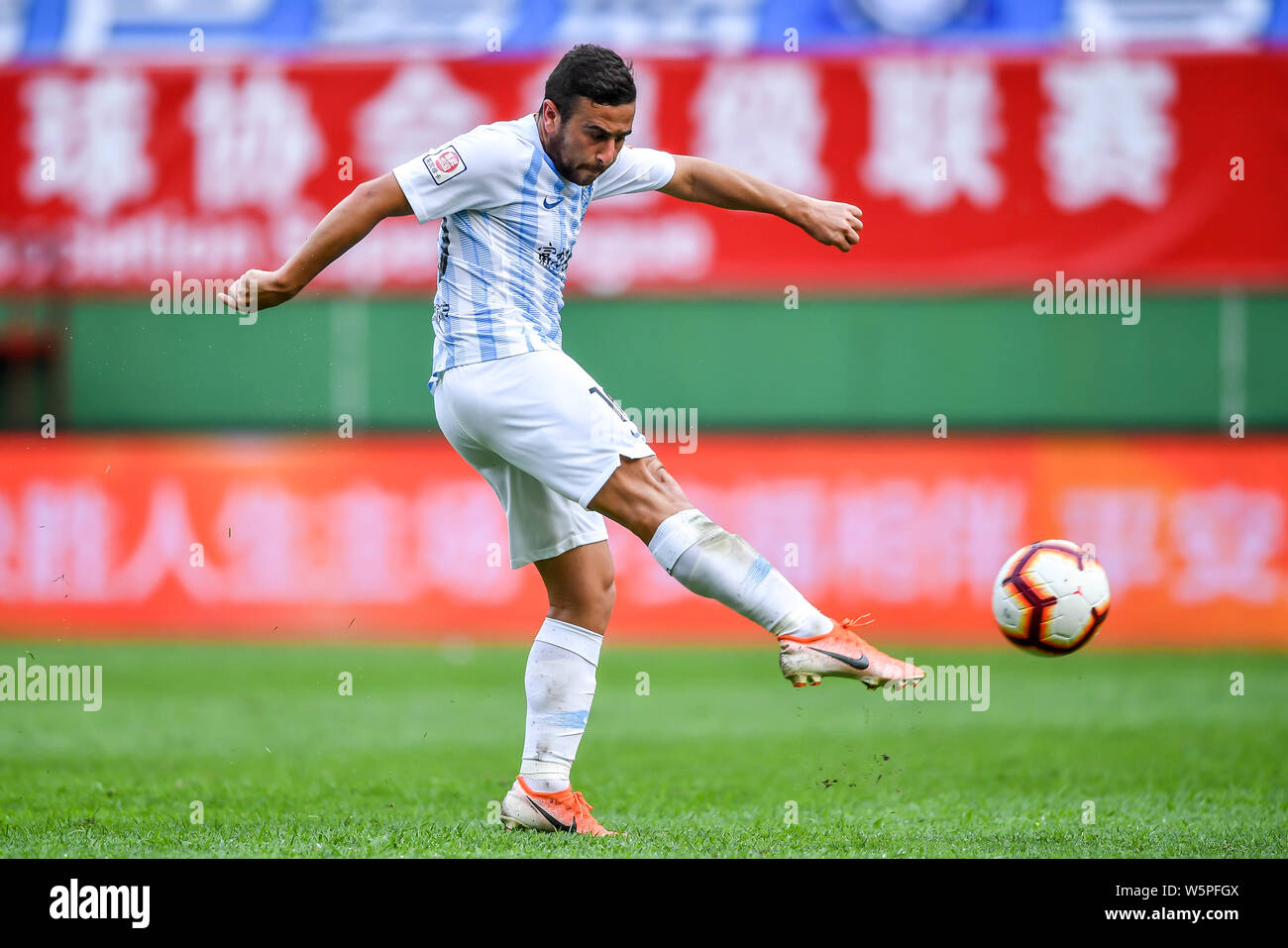 Israeli-Arab football player Dia Saba of Guangzhou R&F shots the ball ...