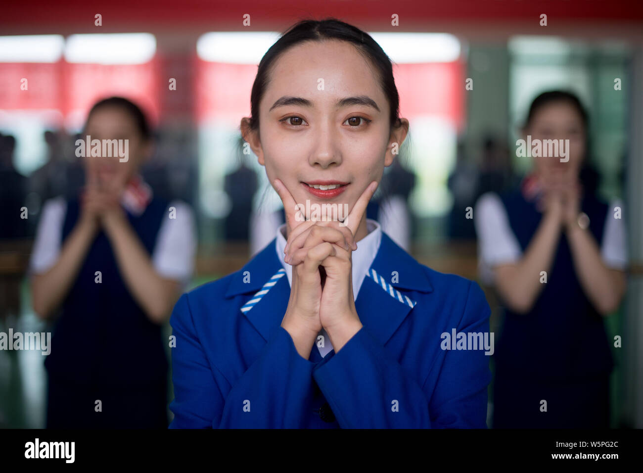 Smiling youth china hi-res stock photography and images - Alamy