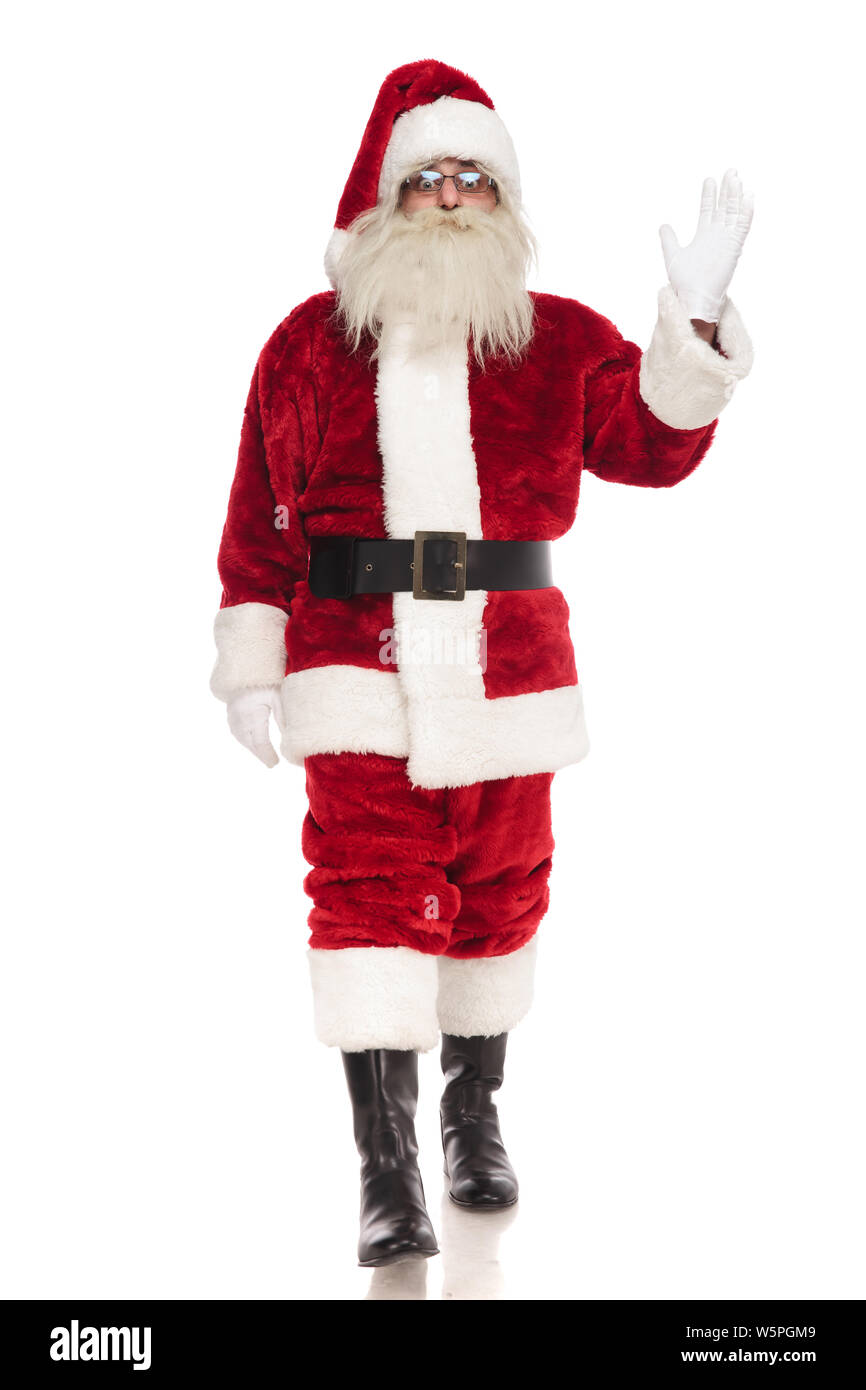 santa claus stepping forward on white background and making hello ...