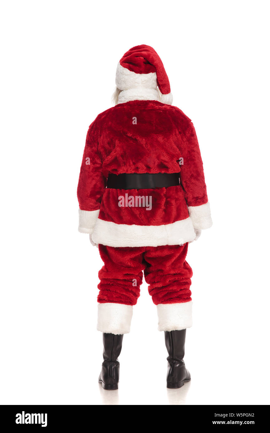 rear view of santa claus standing on white background and waiting in ...