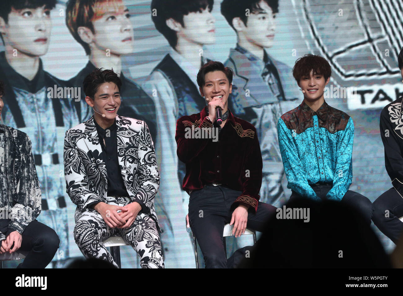 Members of NCT's China unit WayV perform during the showcase to release ...