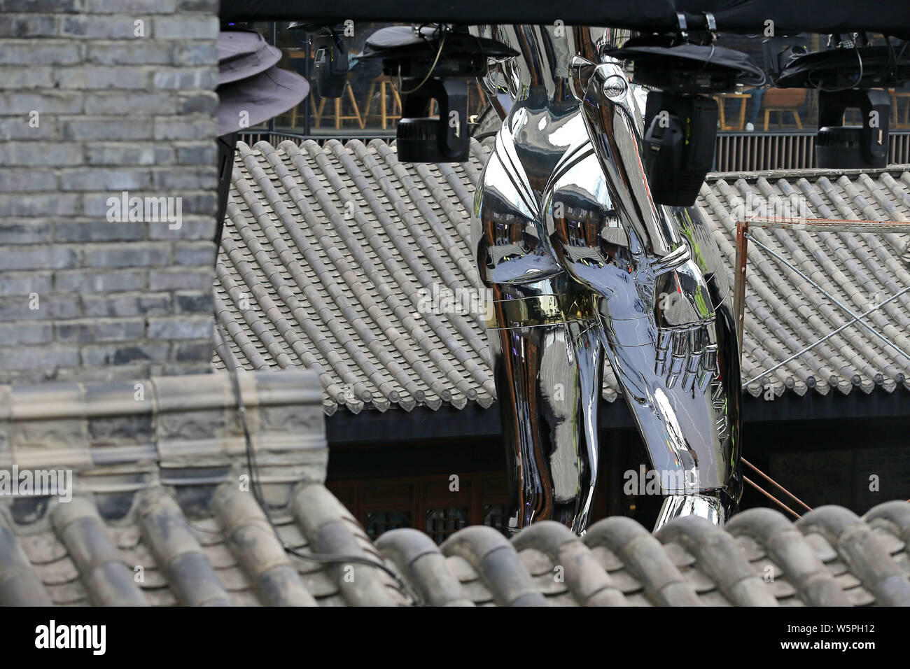 A 10-meter-tall sculpture featuring shape of a robotic beauty is ...