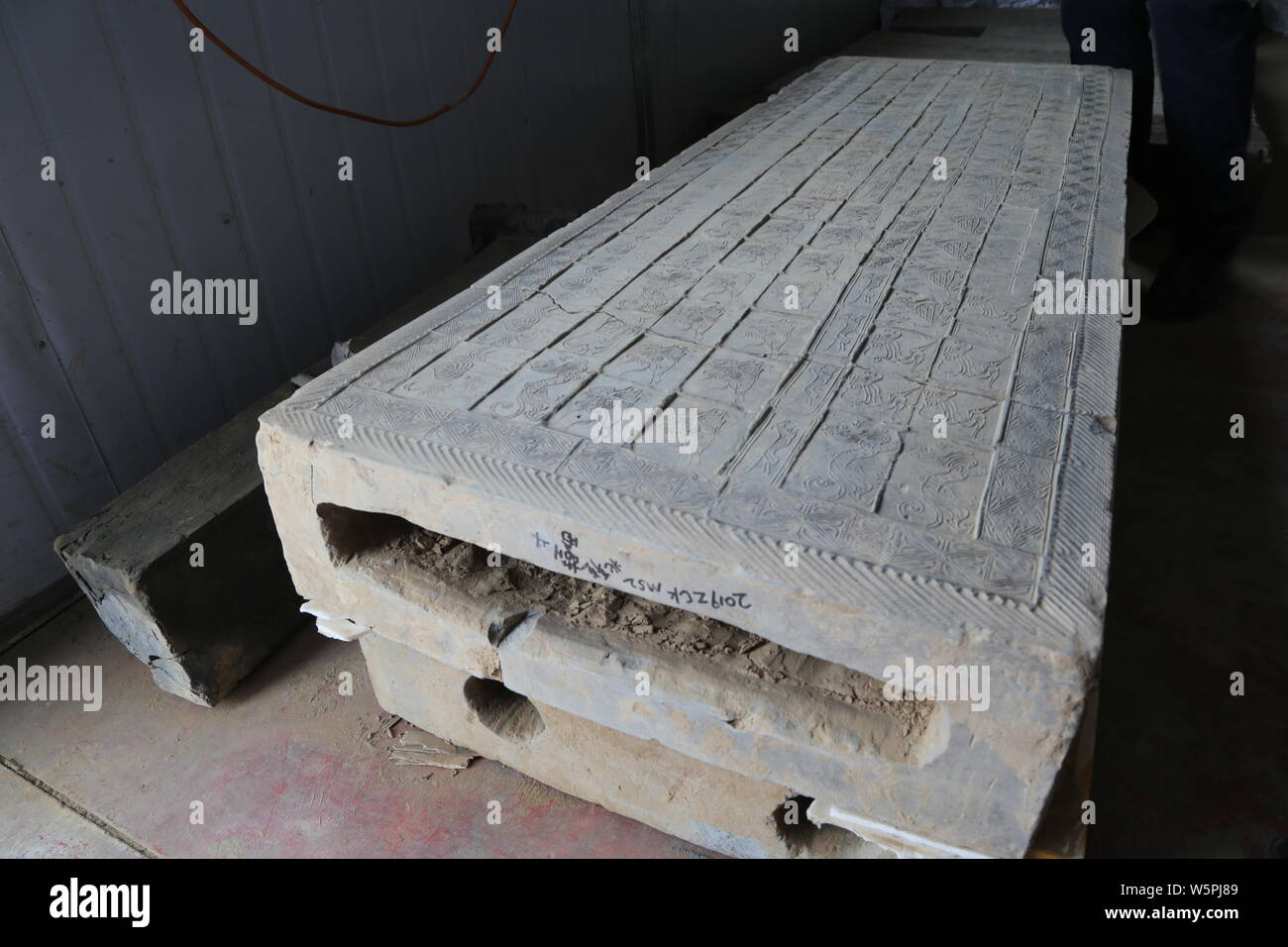 Portrait stones and bricks are unearthed from the ancient tombs dating ...