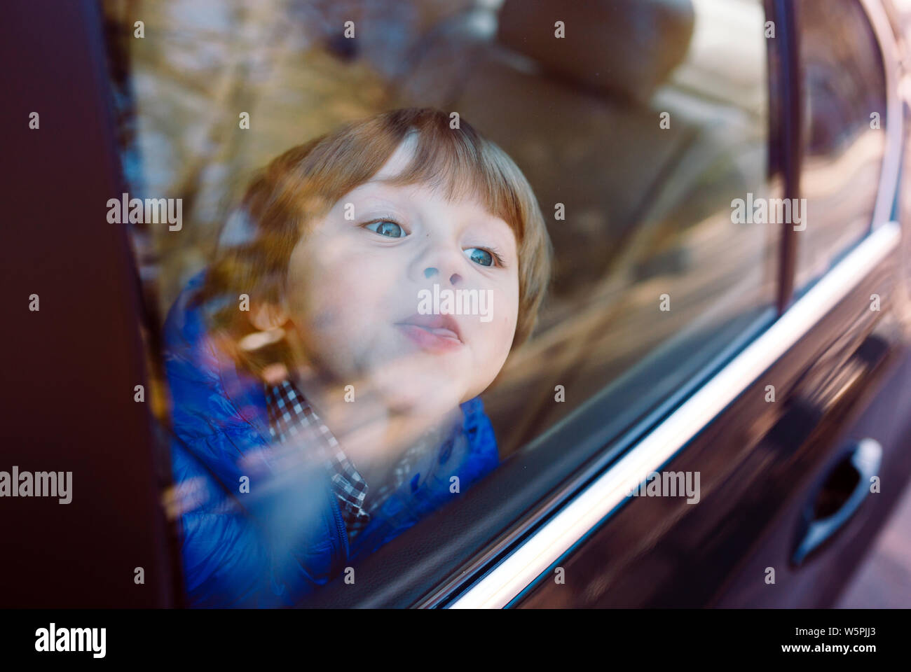 Child Behind Wheel Of Car High Resolution Stock Photography and Images ...