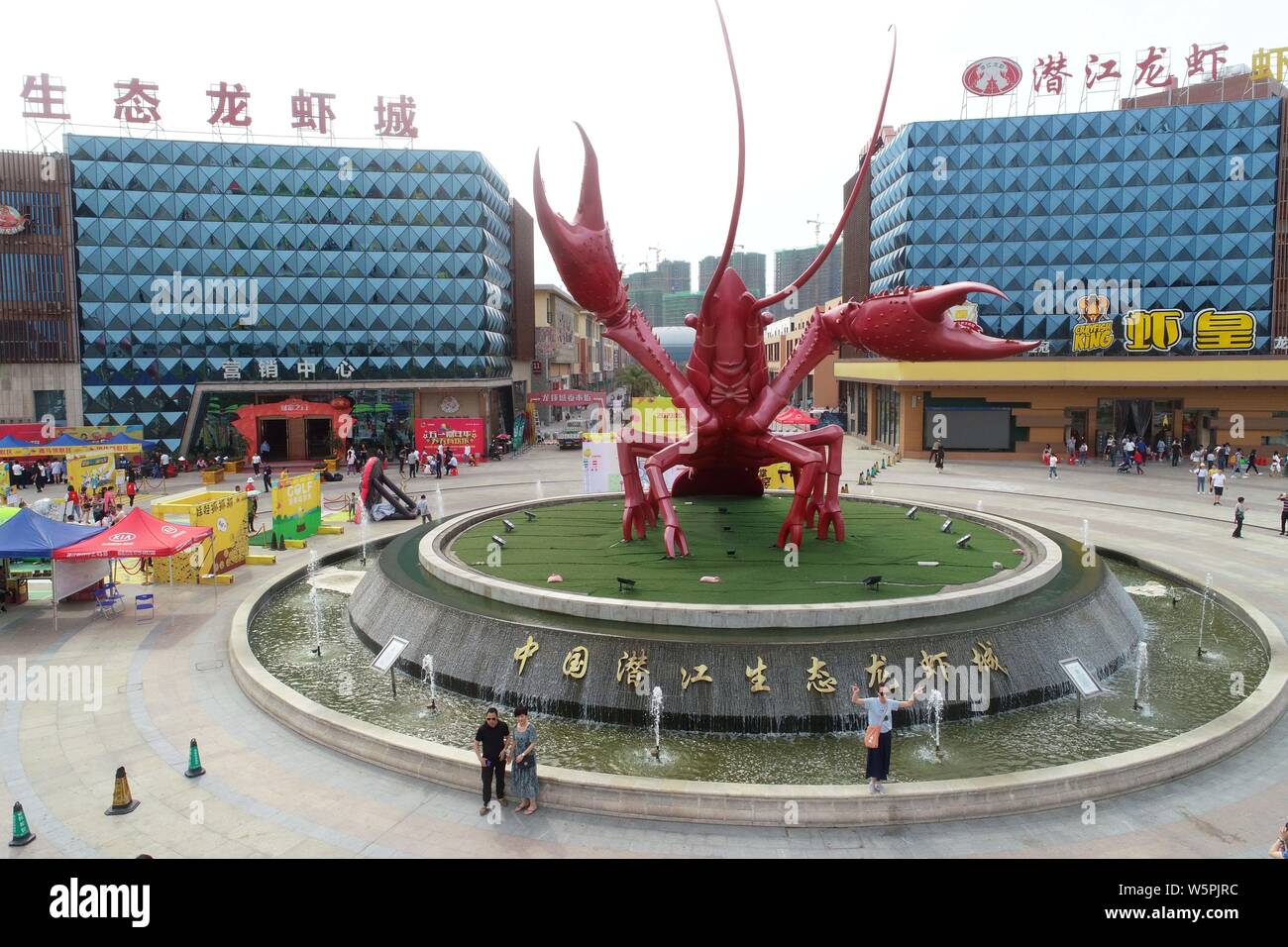 A huge sculpture featuring the shape of crayfish is displayed at a ...