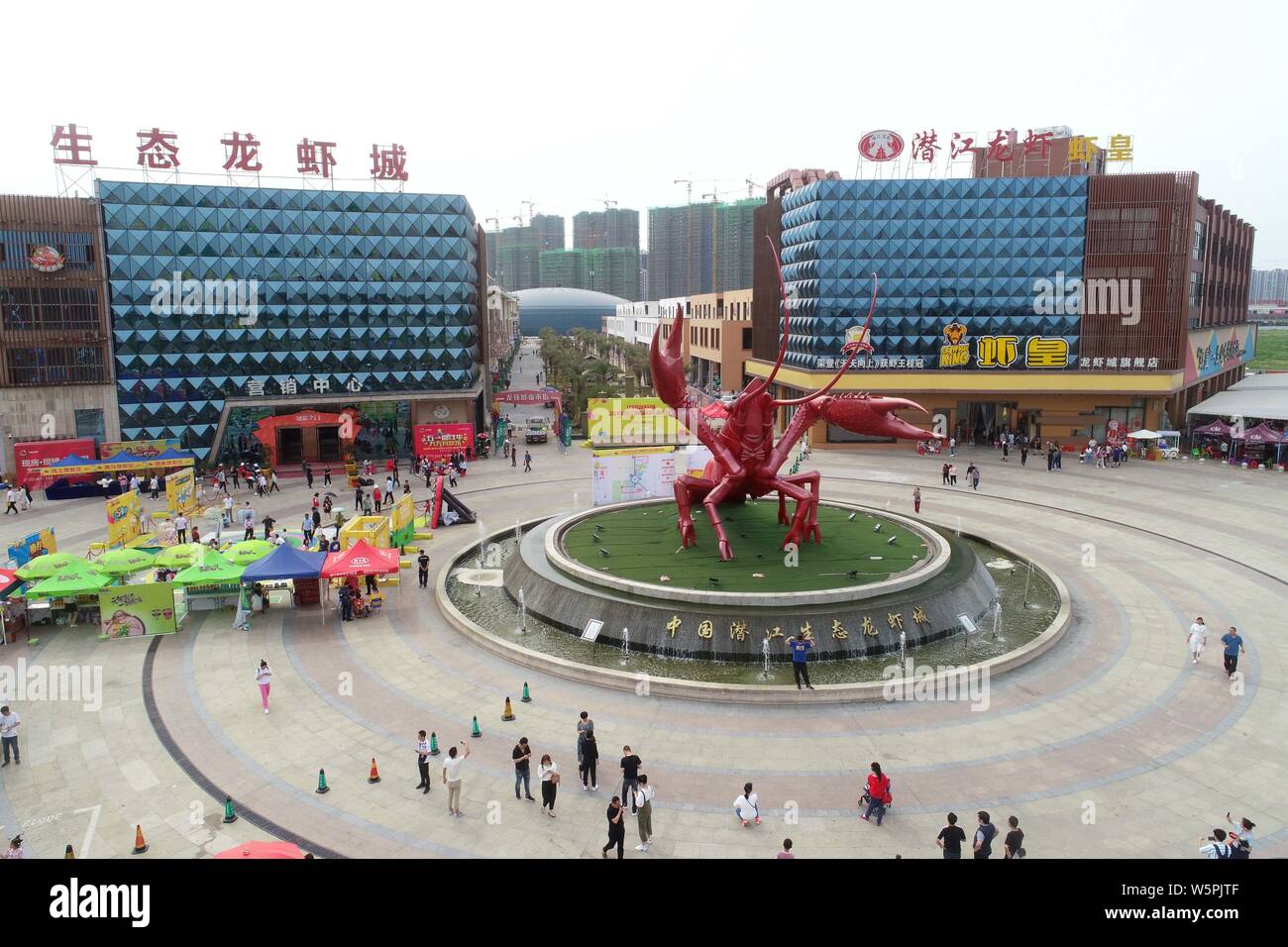 A huge sculpture featuring the shape of crayfish is displayed at a ...