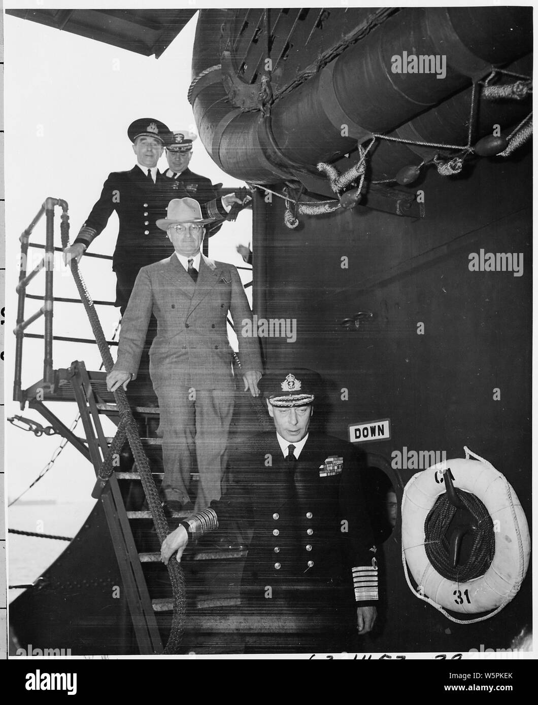 King George VI of England precedes President Harry S. Truman down the ...
