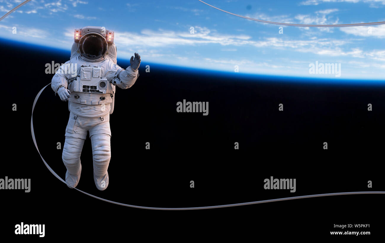astronaut with safety tether performing a spacewalk in empty space ...