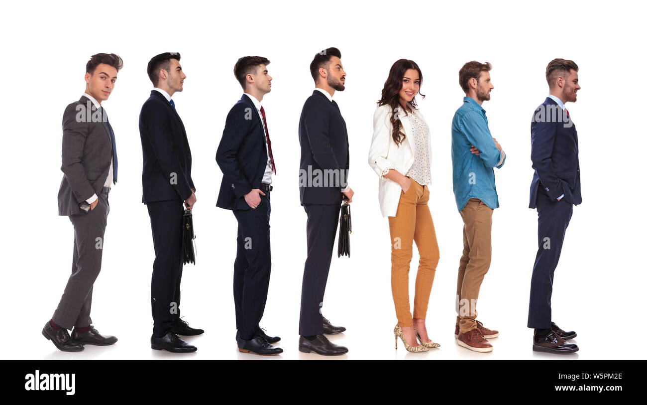 businessmen and businesswoman waiting in line for job interview while ...