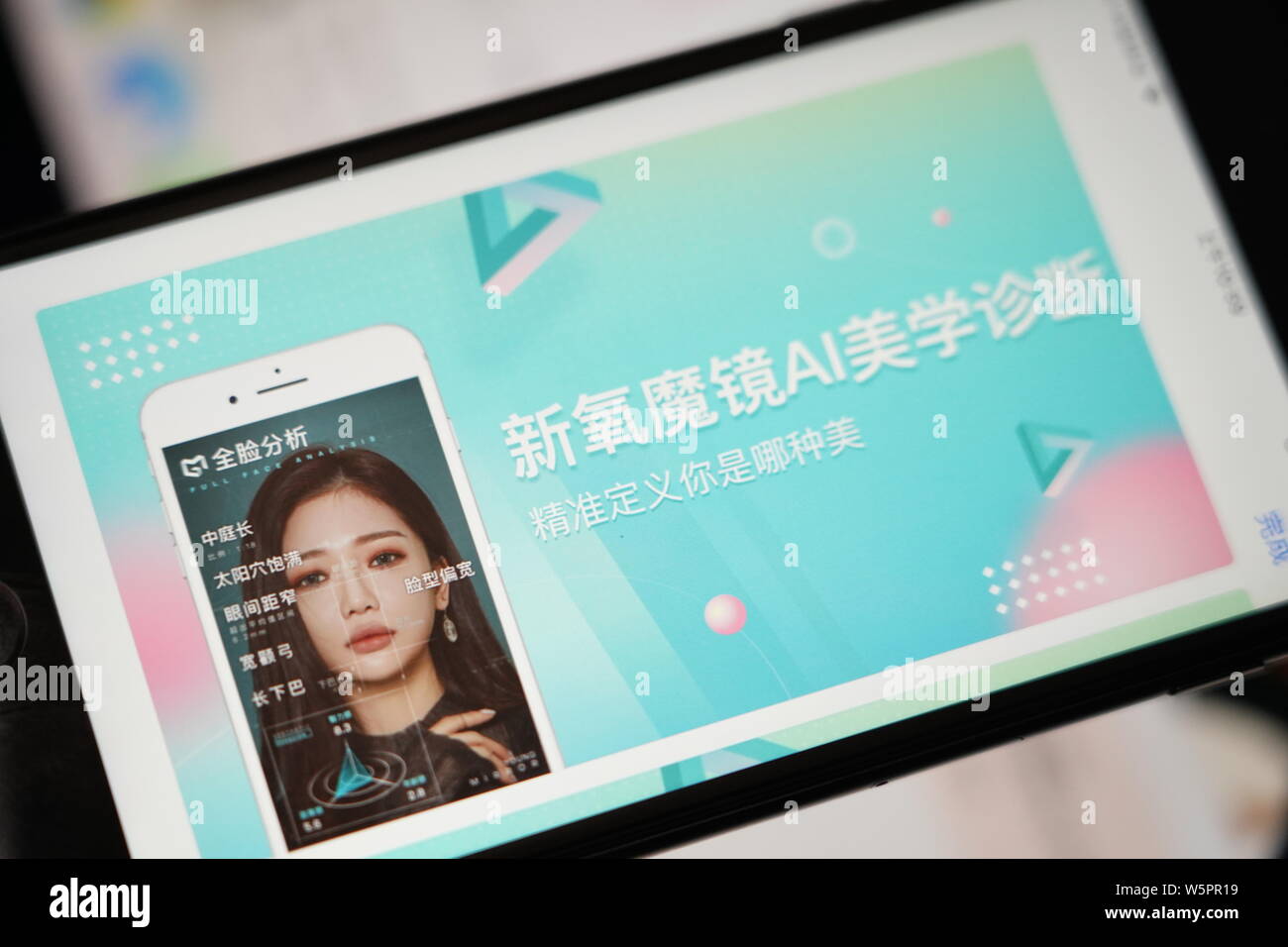 A netizen browses the mobile app of Chinese online platform for medical ...