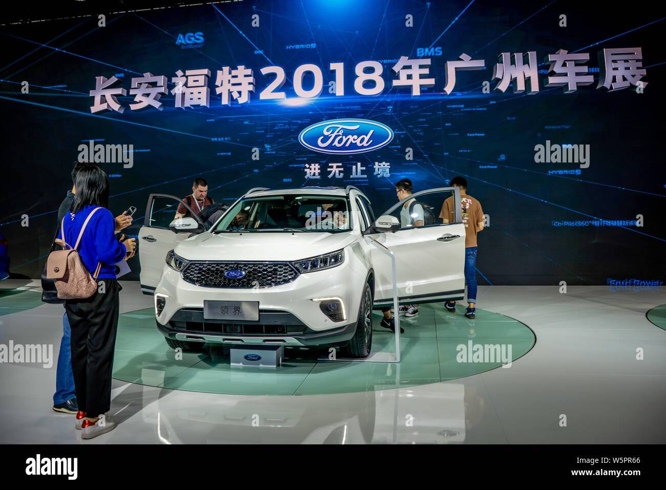 --FILE--People visit the stand of Changan Ford during the 16th China ...
