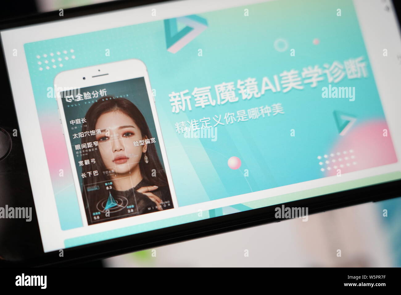 A netizen browses the mobile app of Chinese online platform for medical ...