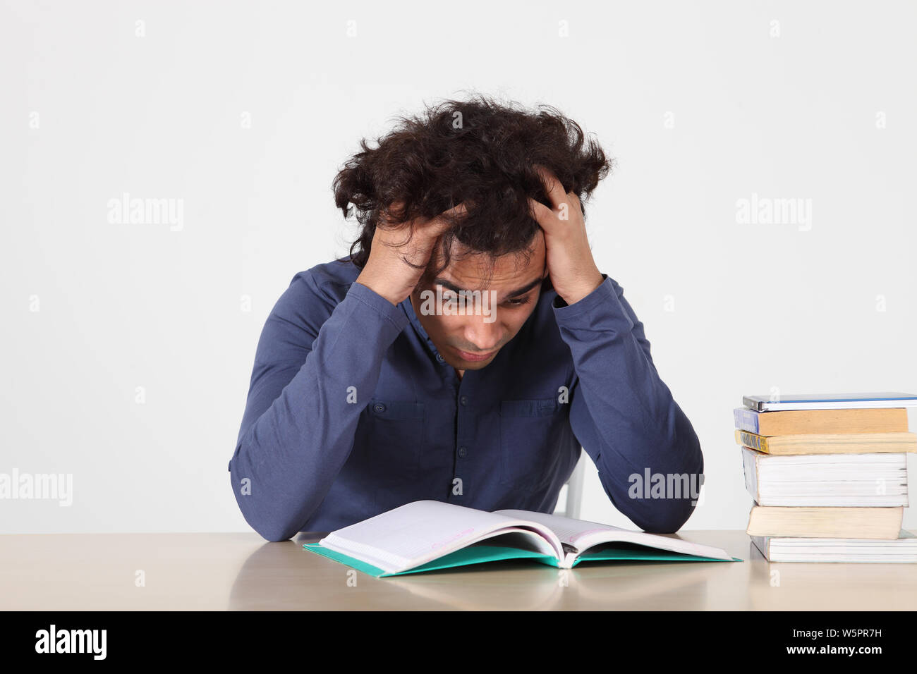 College student looking frustrated Stock Photo - Alamy
