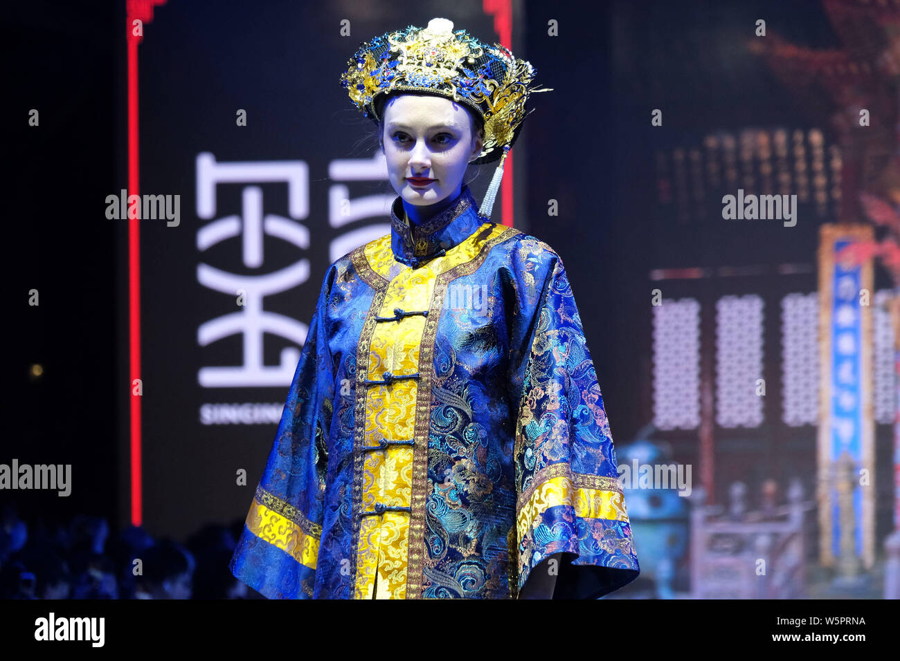 A model dressed in Cheongsam, a traditional Chinese dresses also known ...