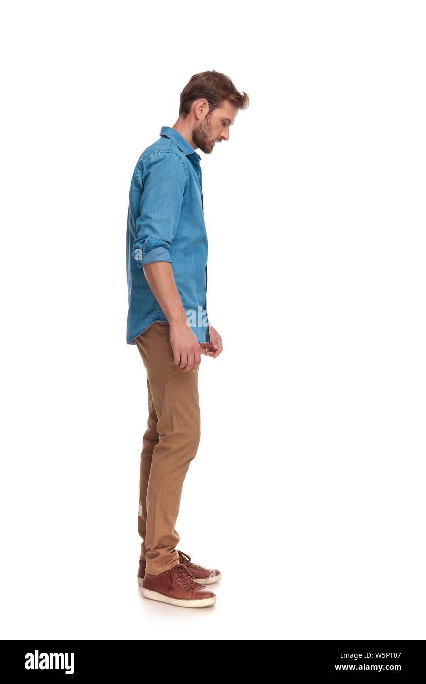 Person Standing Sideways Looking Down