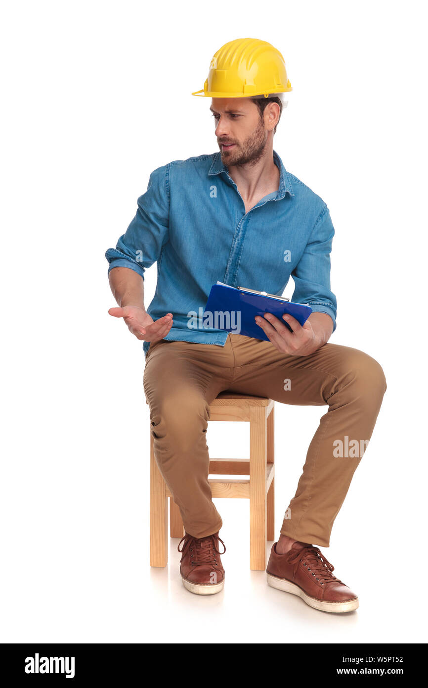 confused construction engineer asking for details white sitting on ...