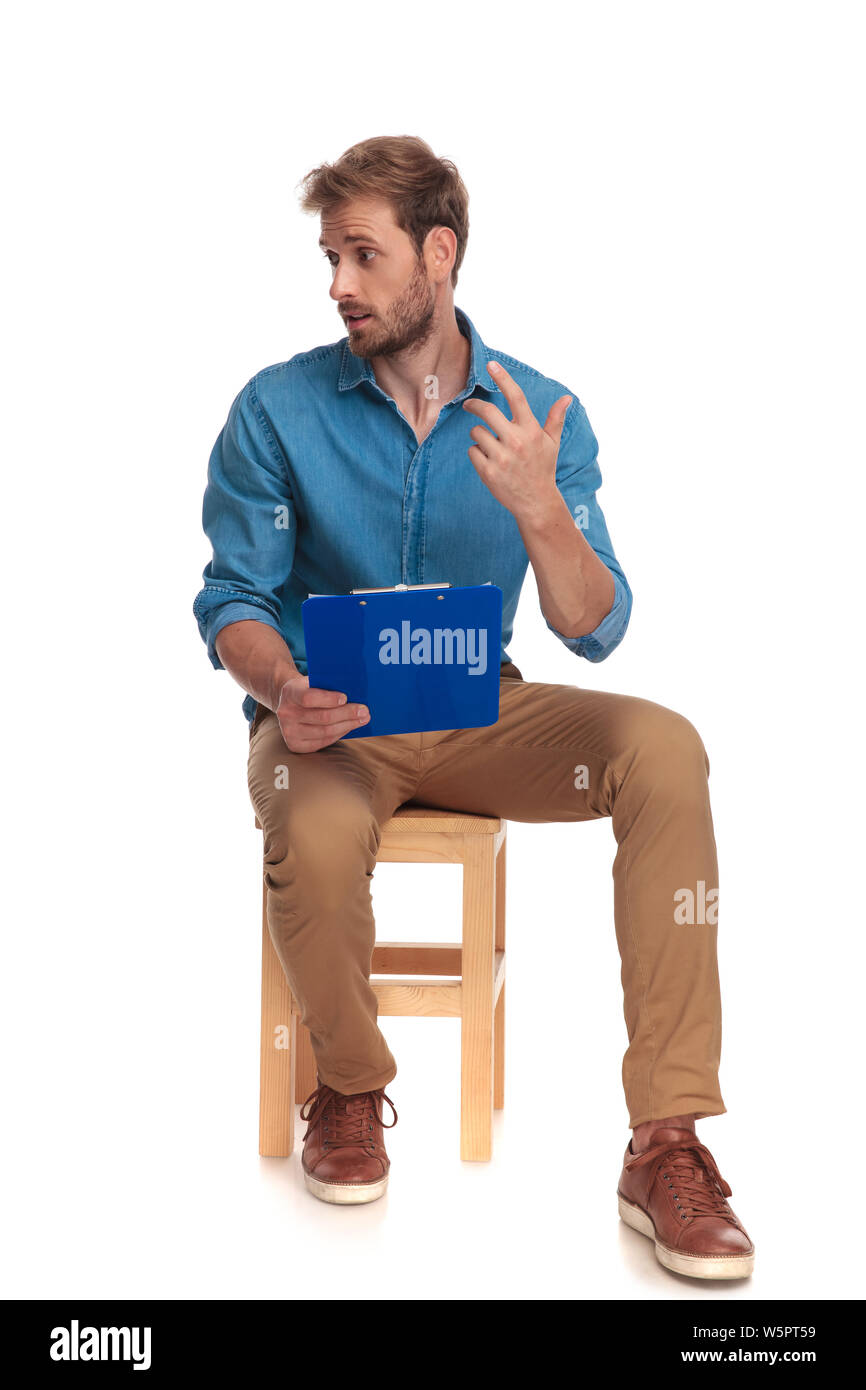 surprised student is asking for answers on white background Stock Photo ...