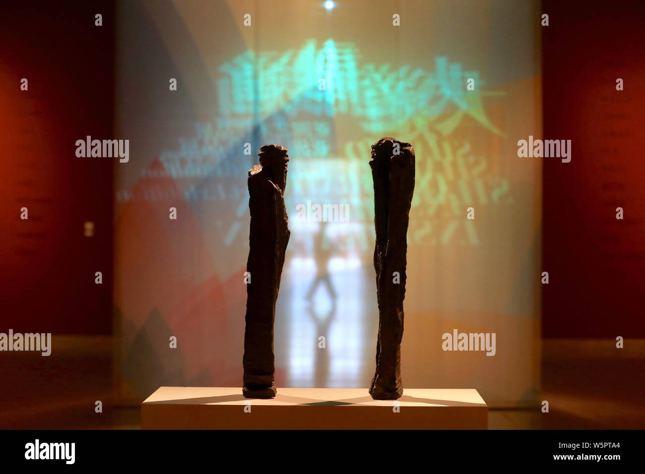 People view the artworks on display during a major cross-border ...