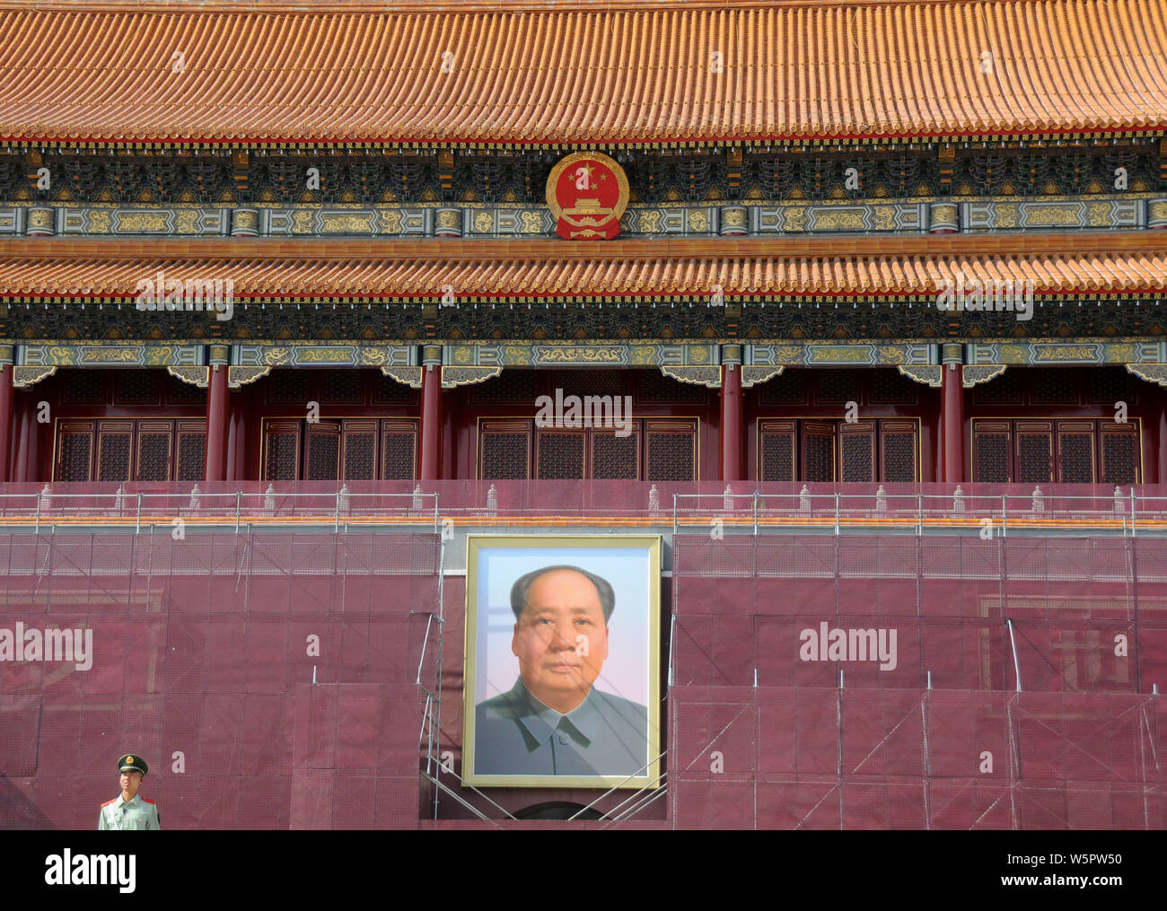 A Chinese paramilitary policeman stands guard in front of the Tiananmen ...