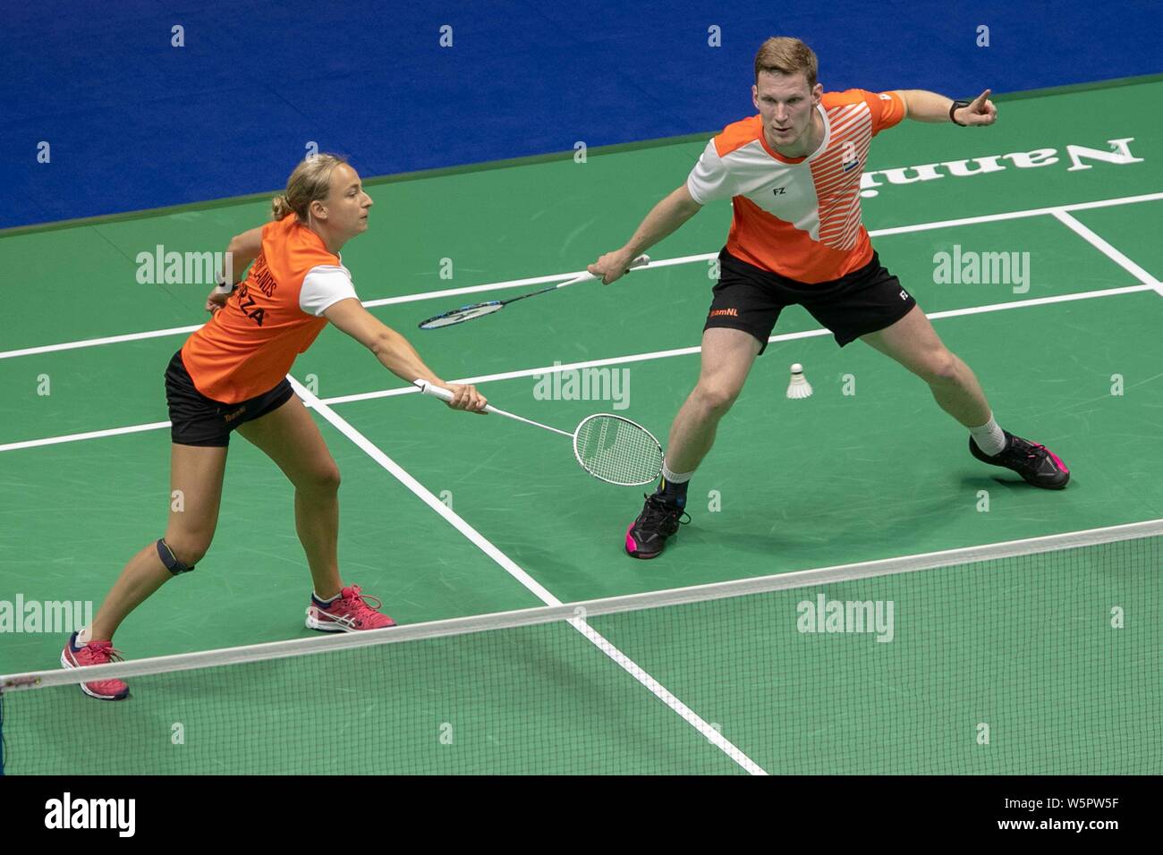 Robin Tabeling and Selena Piek of Netherlands return a shot to Ronan ... Robin Tabeling and Selena Piek of Netherlands return a shot to Ronan ...