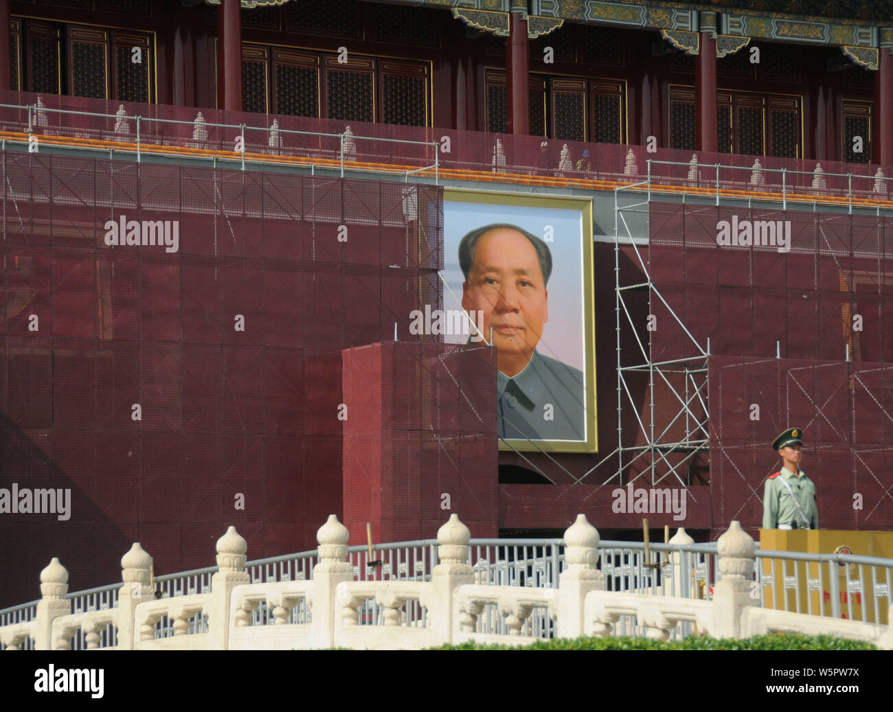 A Chinese paramilitary policeman stands guard in front of the Tiananmen ...