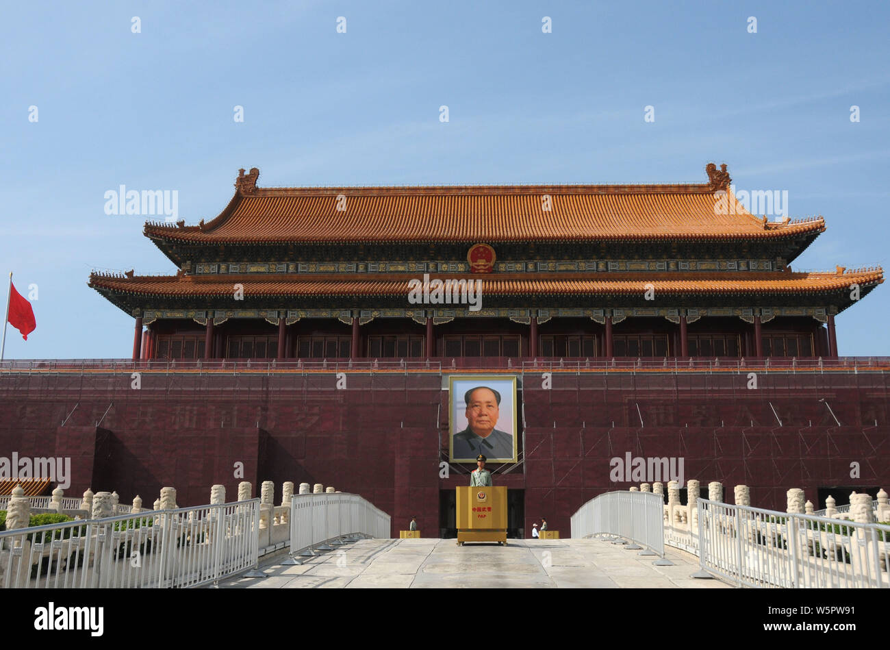 Chinese paramilitary policemen stand guard in front of the Tiananmen ...