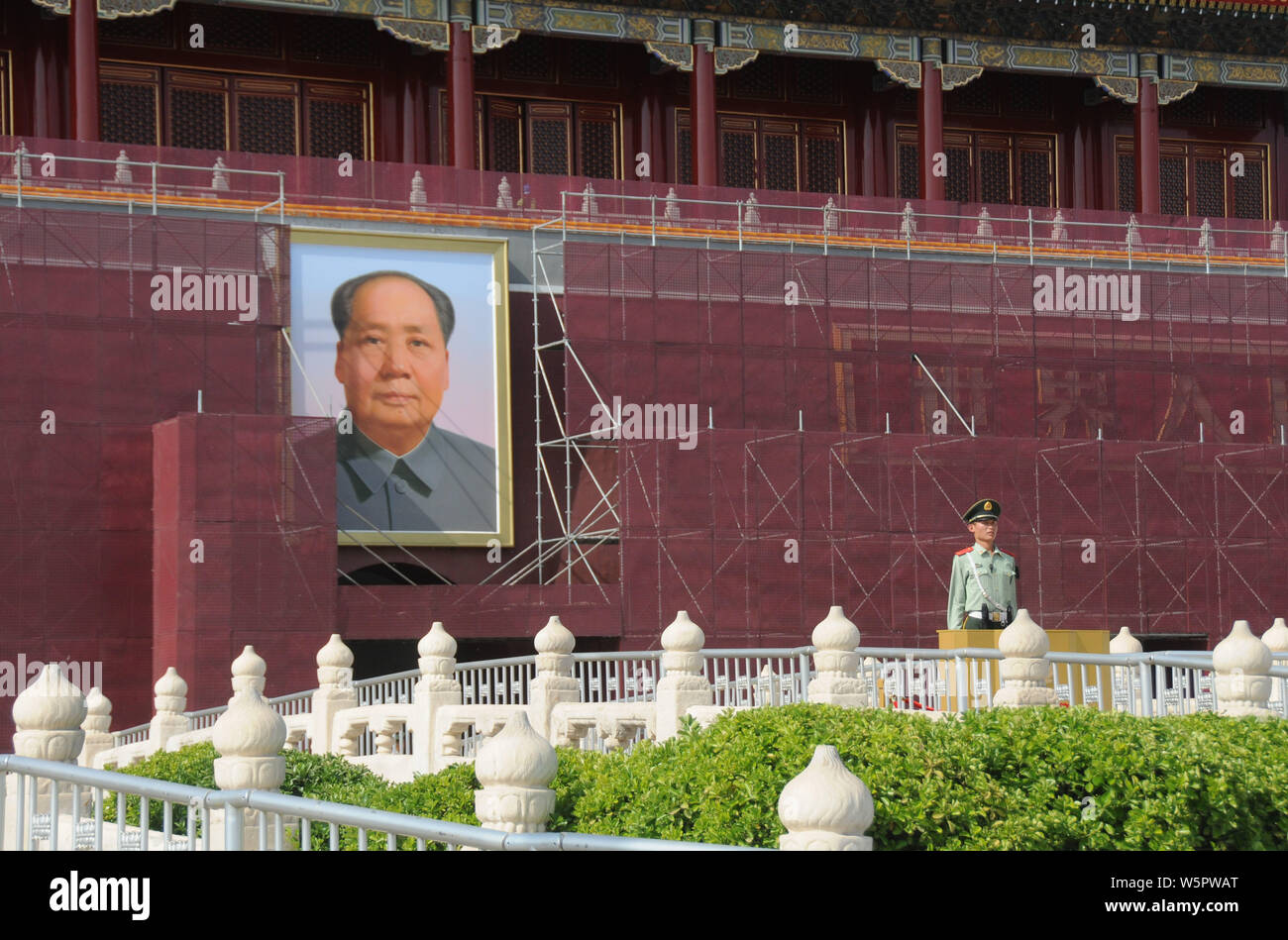 A Chinese paramilitary policeman stands guard in front of the Tiananmen ...