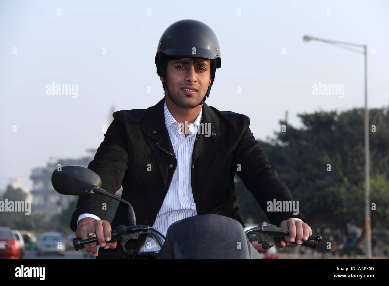 Man riding motorcycle Stock Photo - Alamy