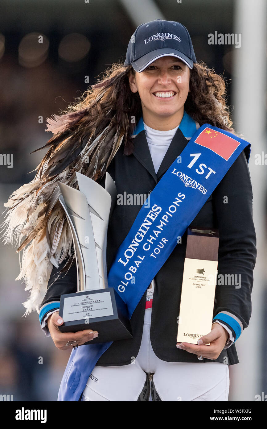 Danielle Goldstein of Israel, left, poses with her trophy after winning ...