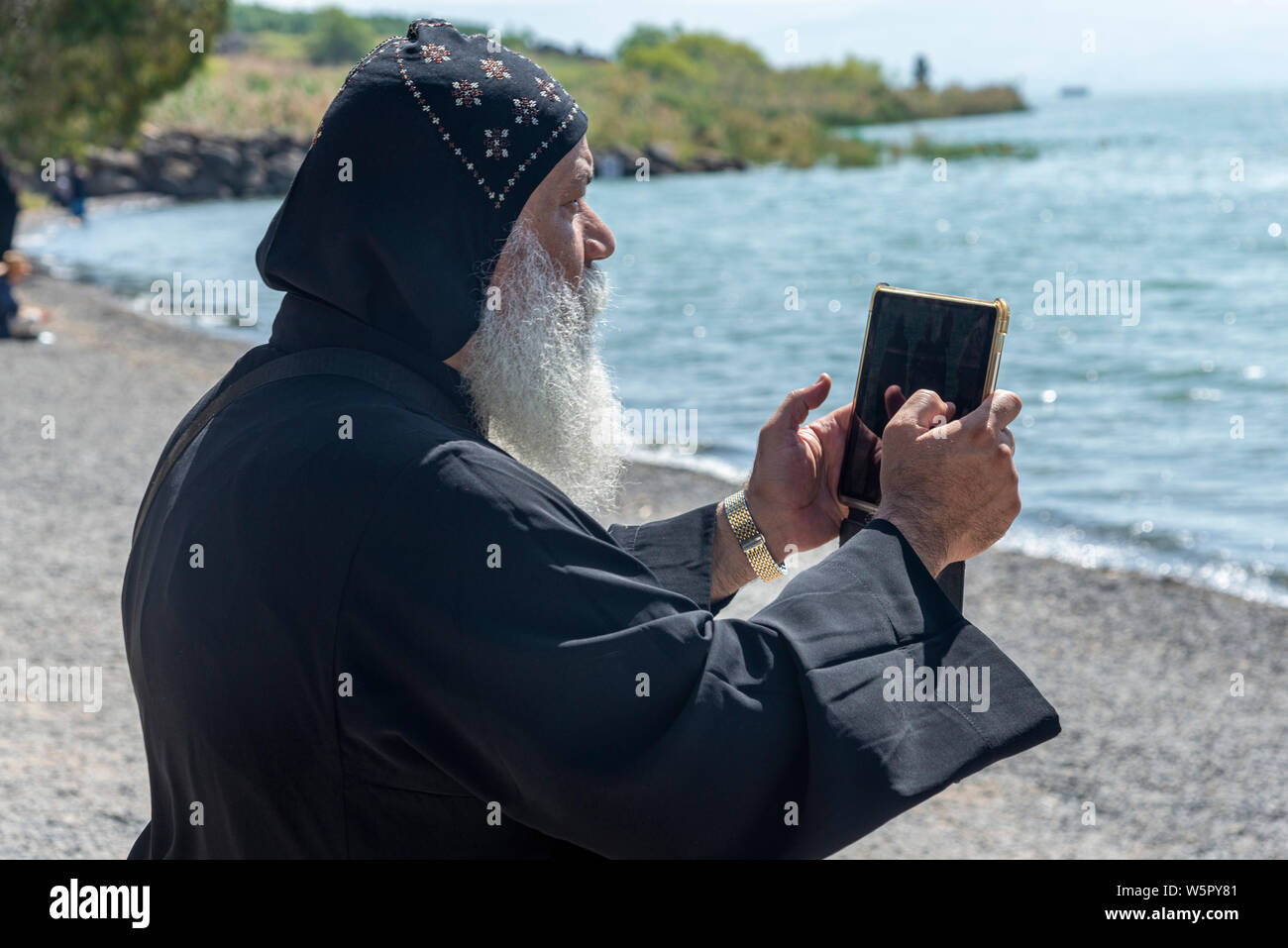 Tabgha, Israel - May 18 2019 : Coptic monk at the church in Tabgha ...