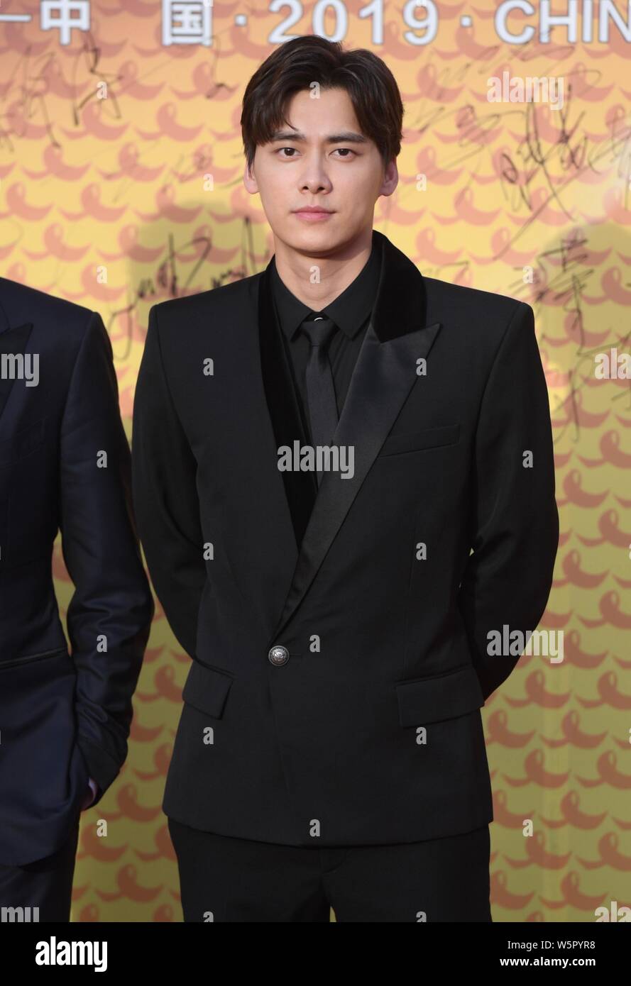 Chinese actor and singer Li Yifeng poses as he arrives on the red ...