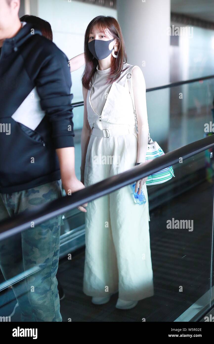 Taiwanese singer and actress Cyndi Wang is seen wearing a face mask ...