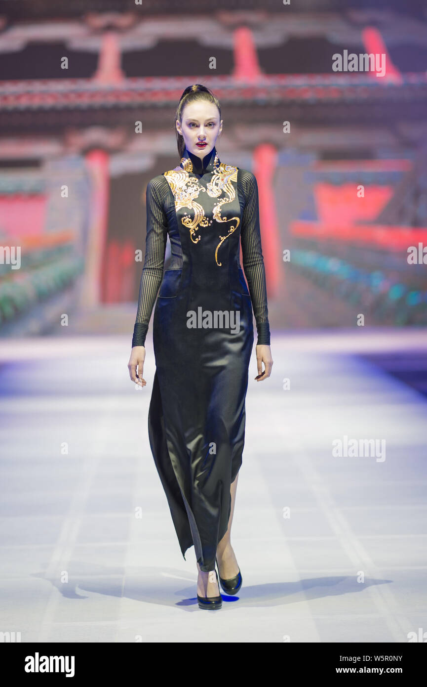 A model dressed in Cheongsam, a traditional Chinese dresses also known ...