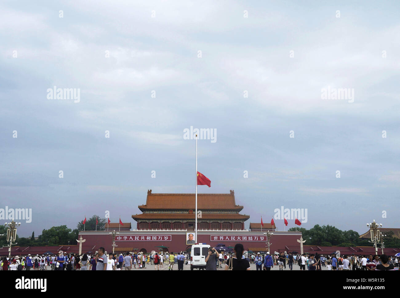 The chinese flag flies at half mast hi-res stock photography and images ...