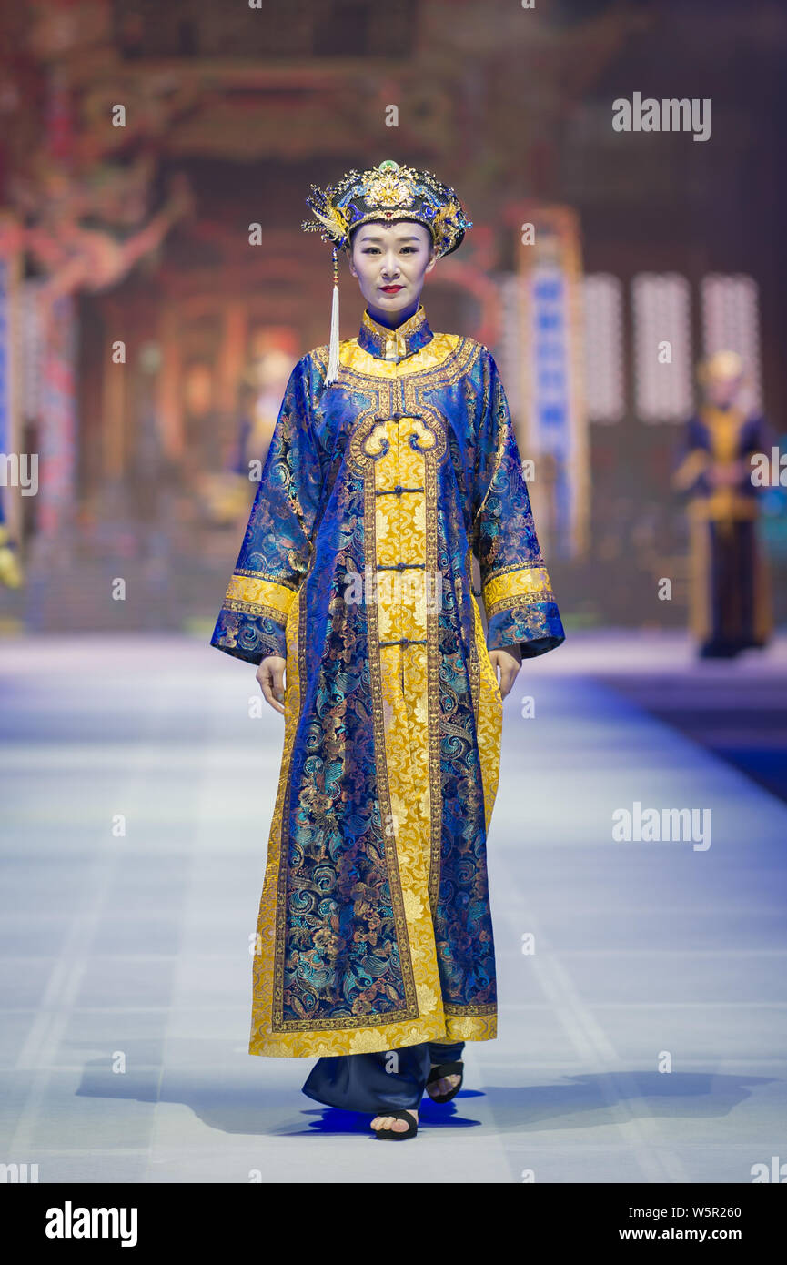 A model dressed in Cheongsam, a traditional Chinese dresses also known ...