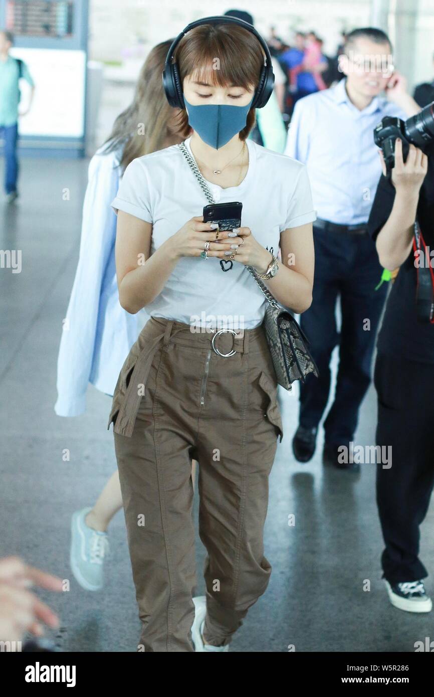 Chinese actress Olivia Wang or Wang Ziwen walks towards the exit after ...